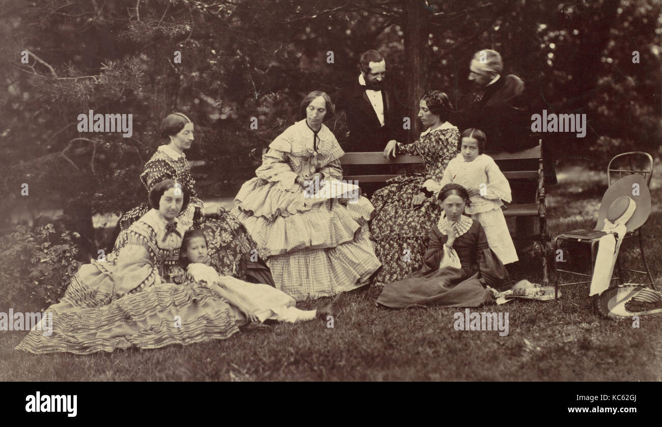 Group Portrait of Four Women, Two Men and Three Children in a Garden ...
