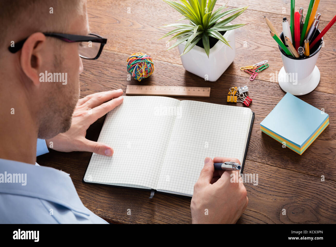 Woman hand writing in open hi-res stock photography and images - Alamy