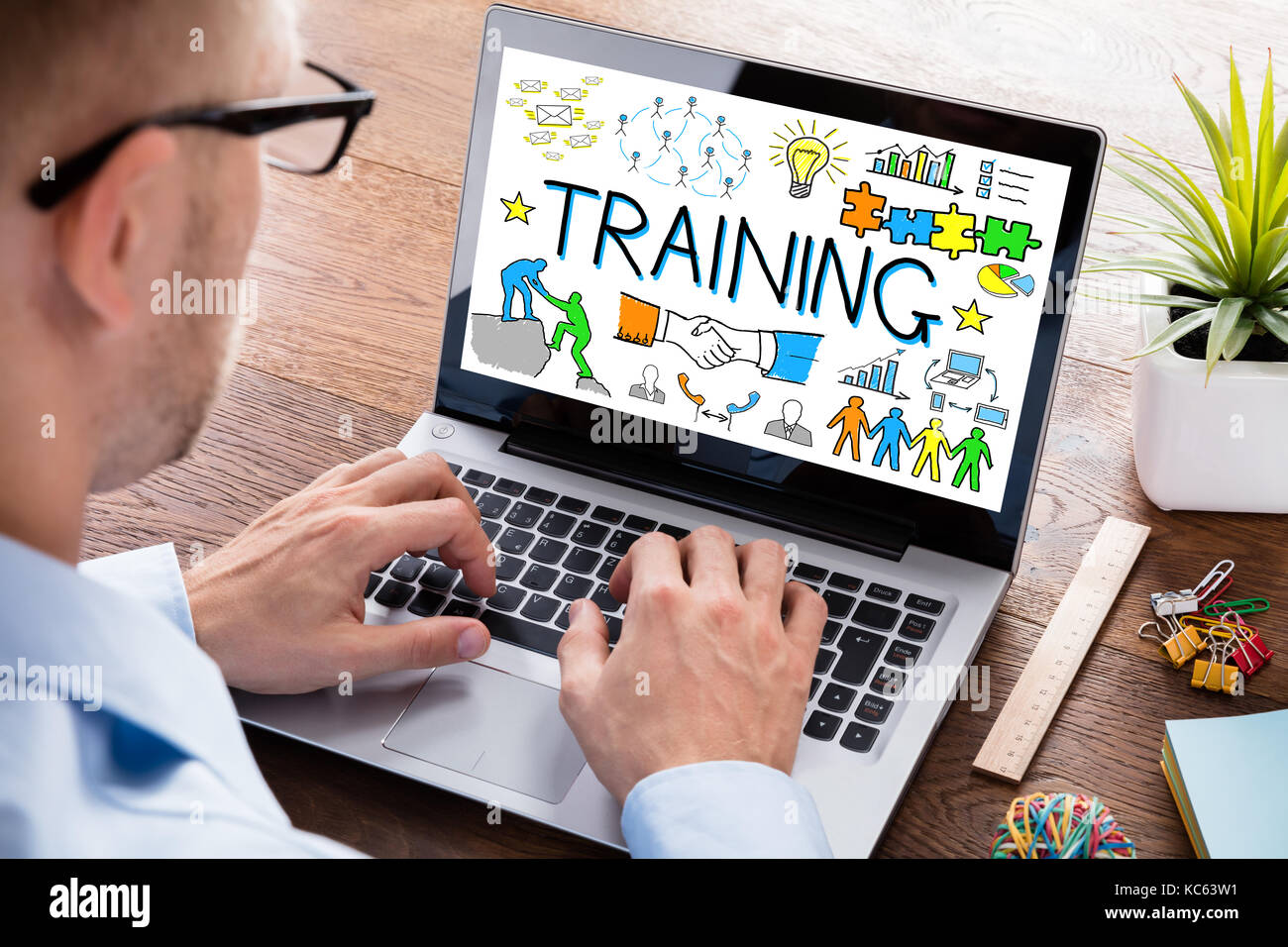 Business Person Working On A Training Concept On Laptop Computer Stock ...