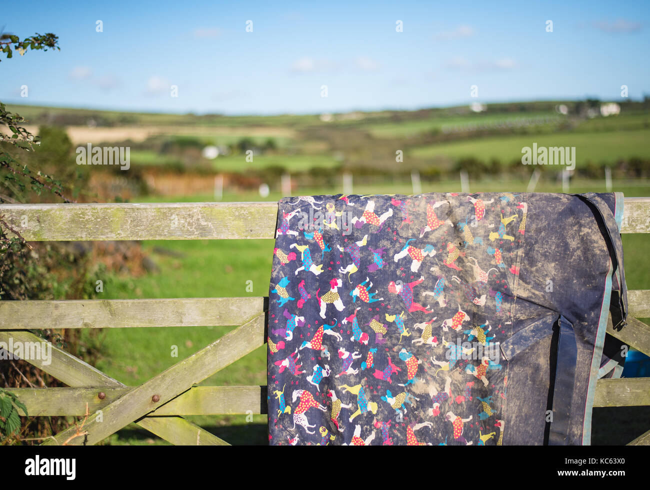 Coat hanging on a gate hi-res stock photography and images - Alamy