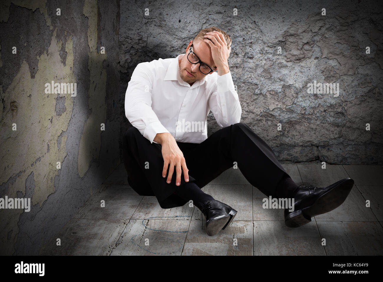 Serious young manager sitting hi-res stock photography and images - Alamy
