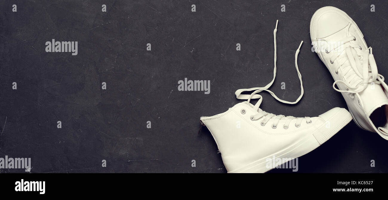 Overhead Shot Of White Sneakers On black Background. Flat lay Stock ...