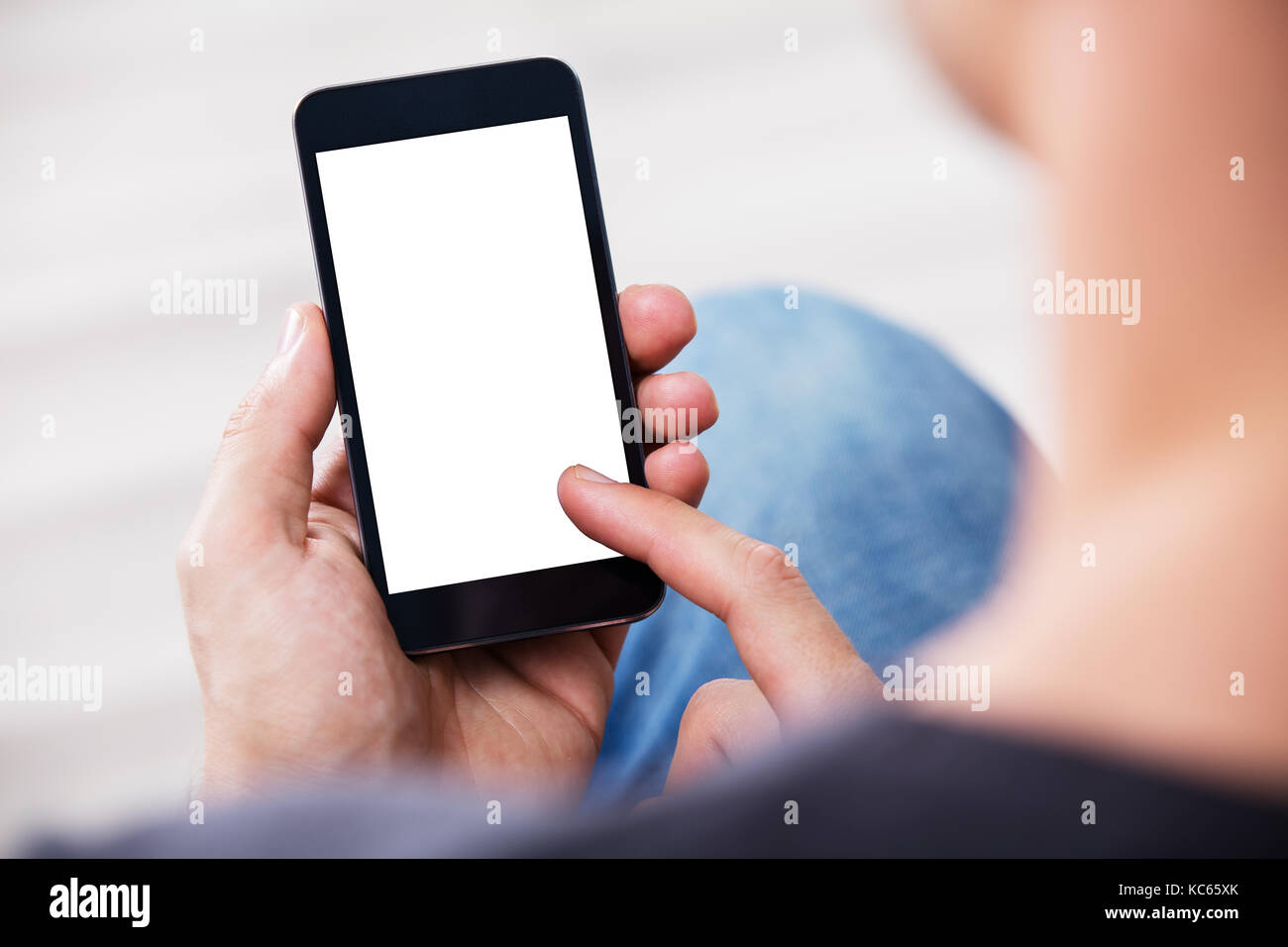 Close-up Of A Man's Hand Holding Cell Phone With Blank Screen Stock ...