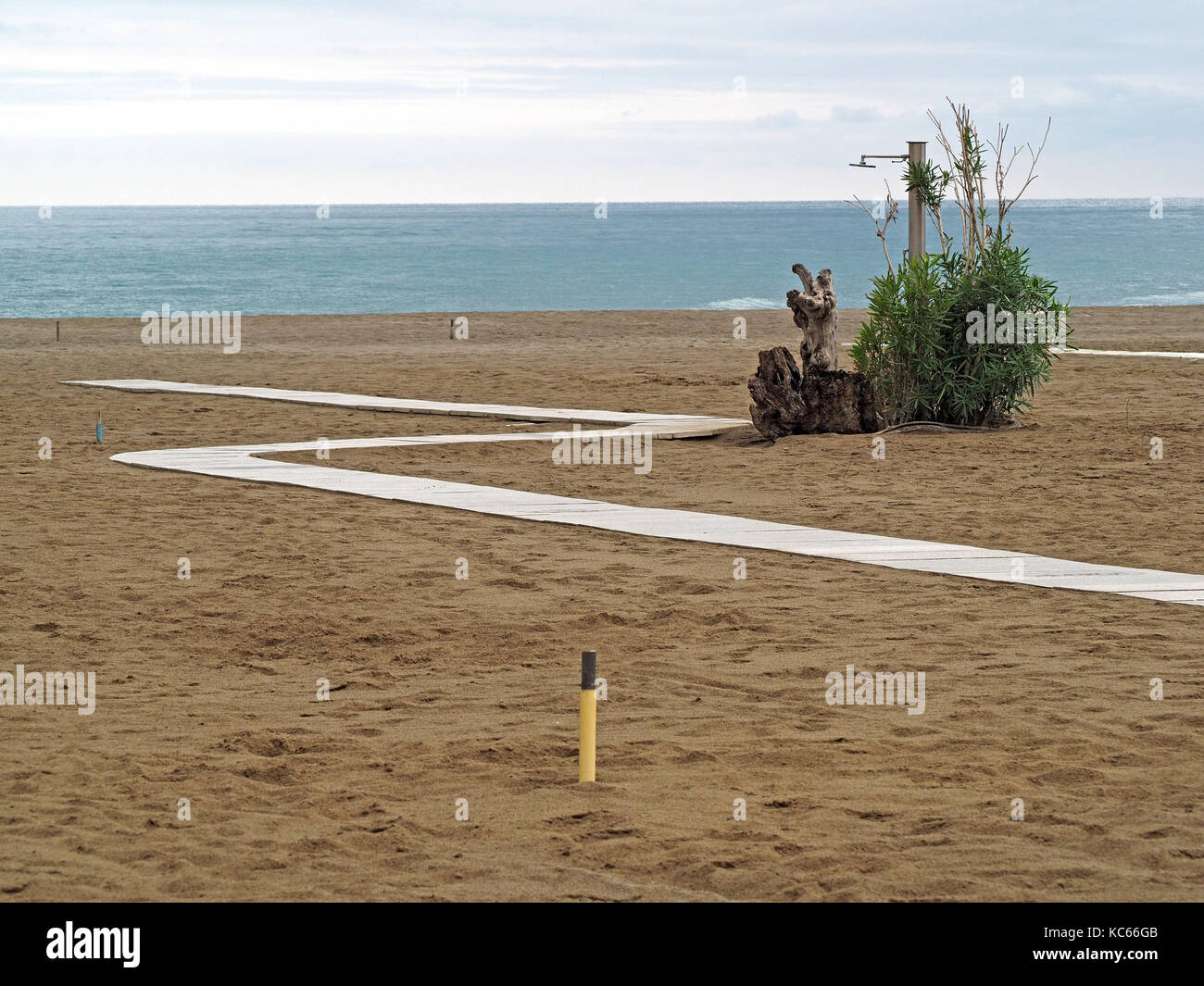 angular paving on commercial beach at the end of the season in Tuscany ...