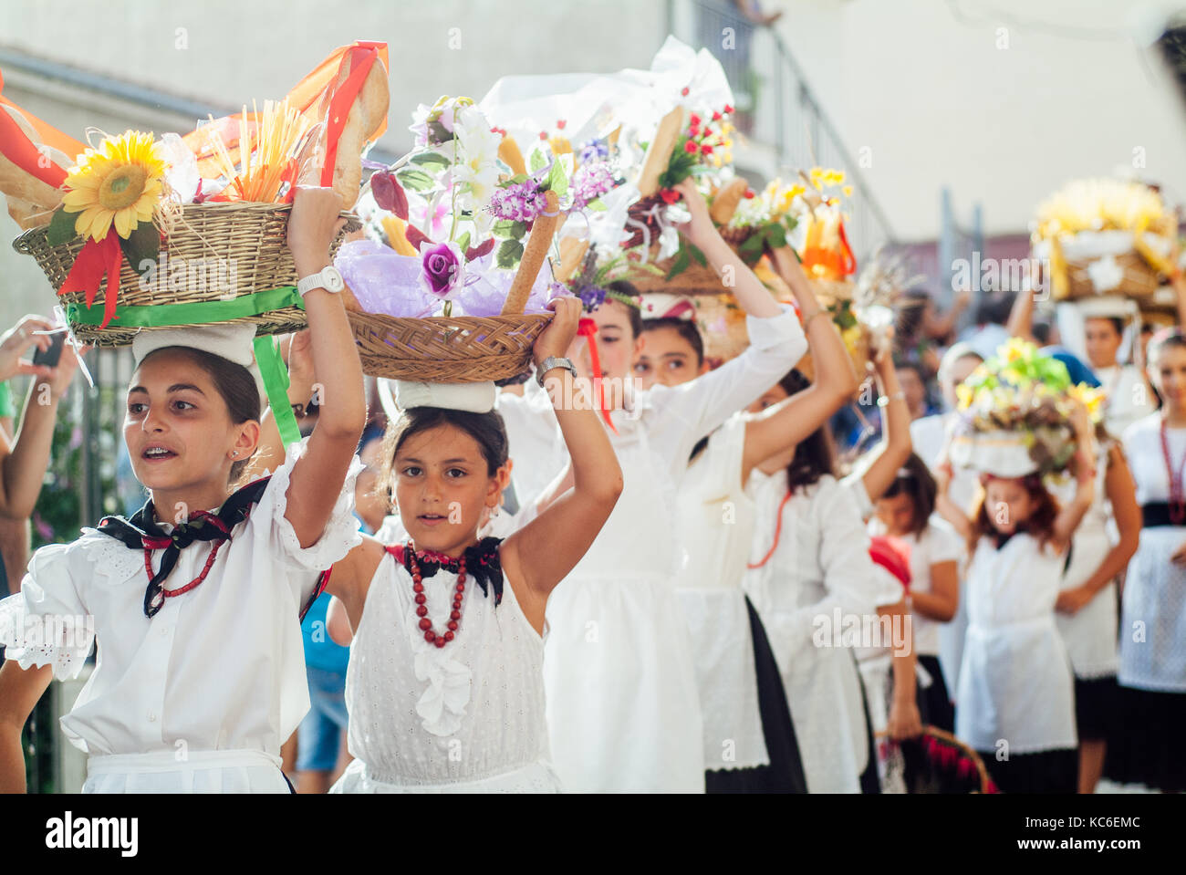 Typical italian folklore young girls celebrating Virgin Mary August ...