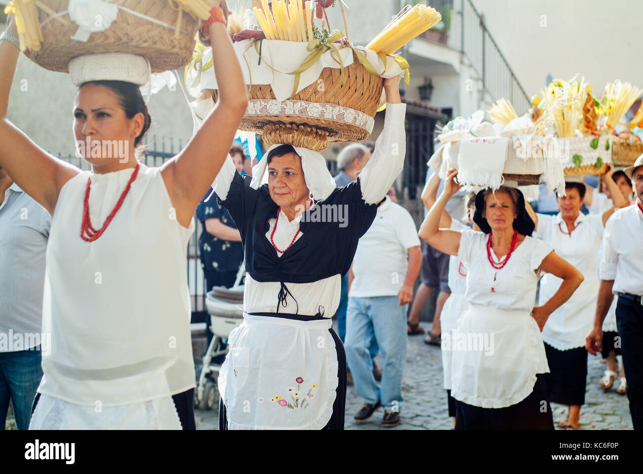 Typical italian folklore mature women celebrating Virgin Mary August ...