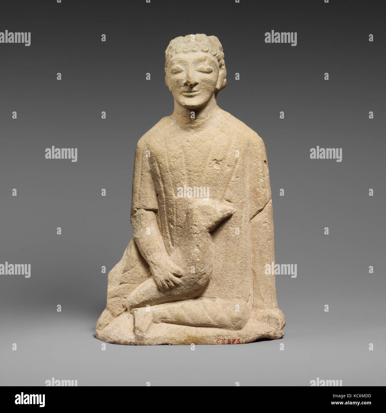 Limestone statuette of a temple boy, 4th century B.C Stock Photo - Alamy