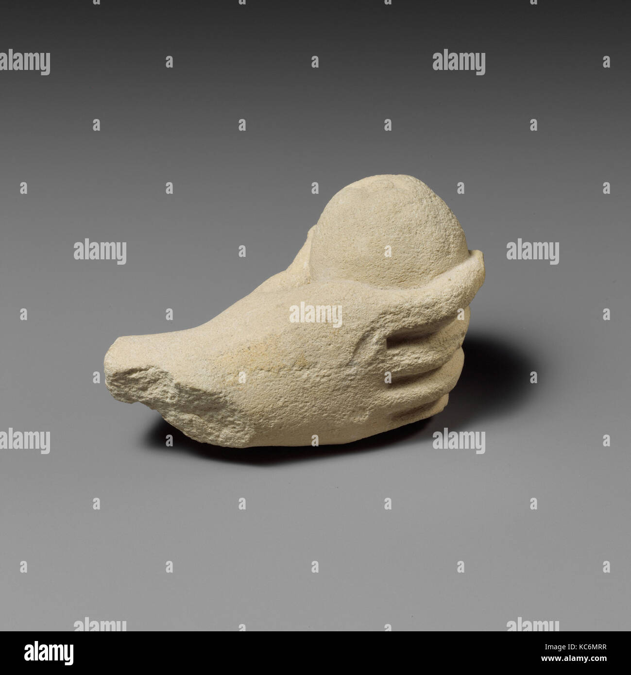 Limestone hand holding a piece of fruit, Cypriot, Limestone, Overall: 2 ...