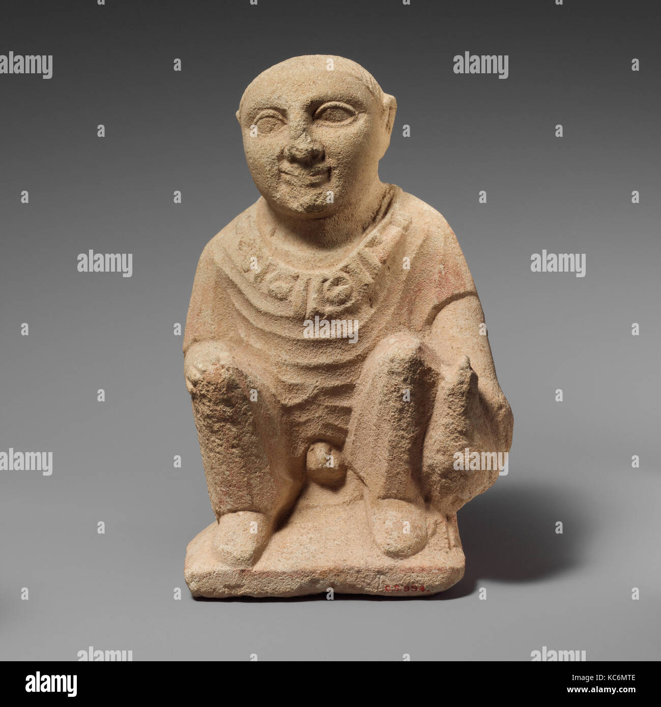 Limestone statuette of a temple boy, 4th century B.C Stock Photo - Alamy