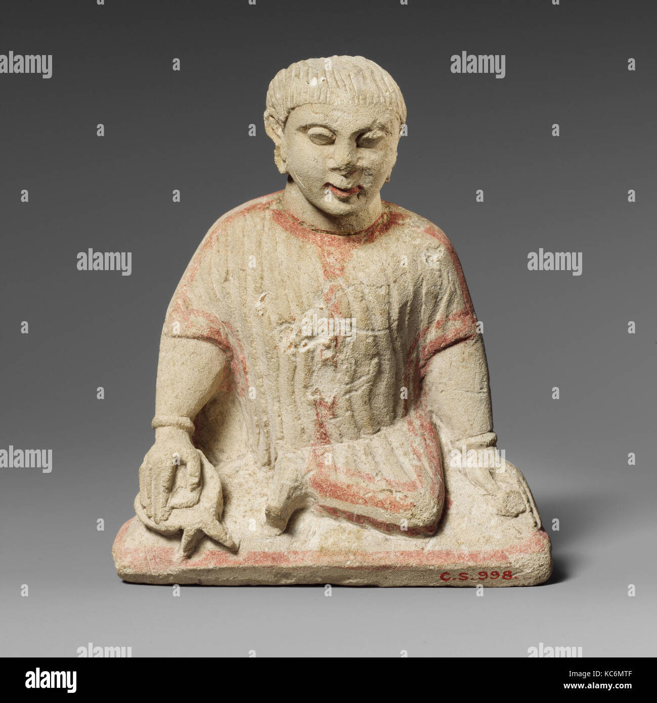 Limestone statuette of a temple boy, 5th century B.C Stock Photo - Alamy