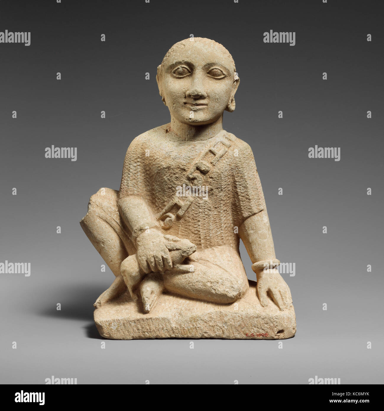Limestone statuette of a temple boy, 4th century B.C Stock Photo - Alamy