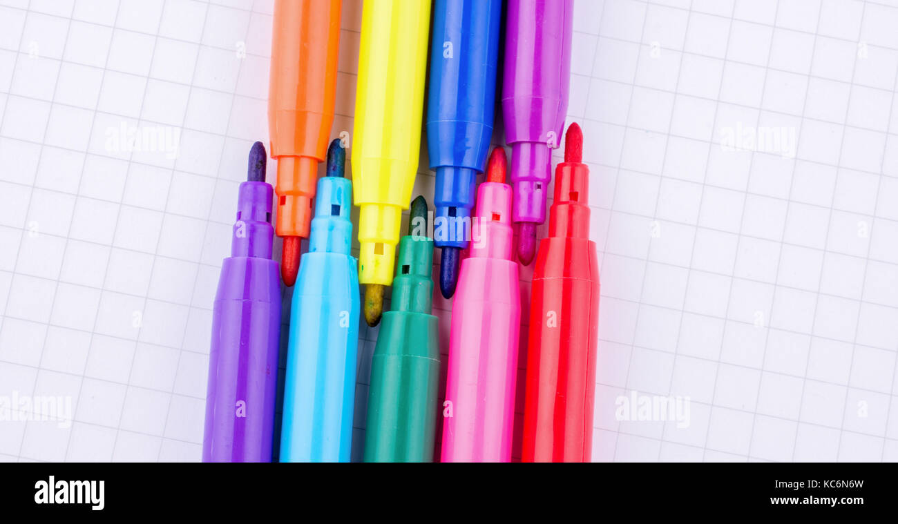Colorful felt-tip pens on a notebook Stock Photo - Alamy