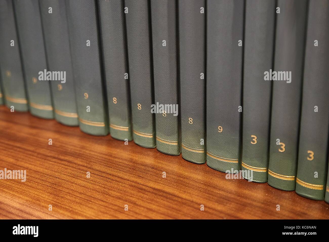 Books on a shelf Stock Photo - Alamy