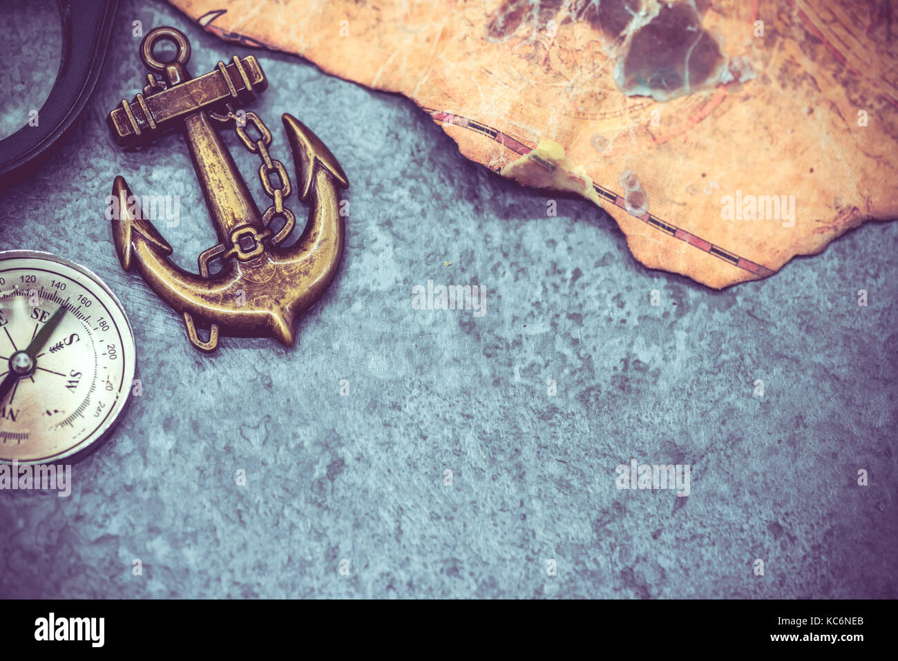 Columbus day and world map with compass Stock Photo - Alamy