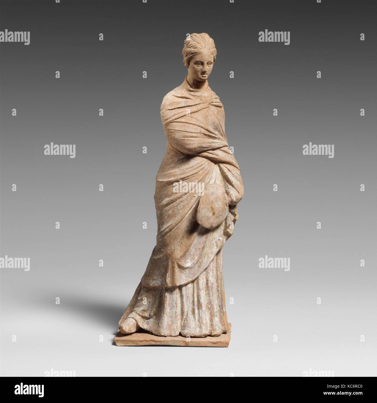 Terracotta statuette of a draped woman, 3rd century B.C Stock Photo - Alamy