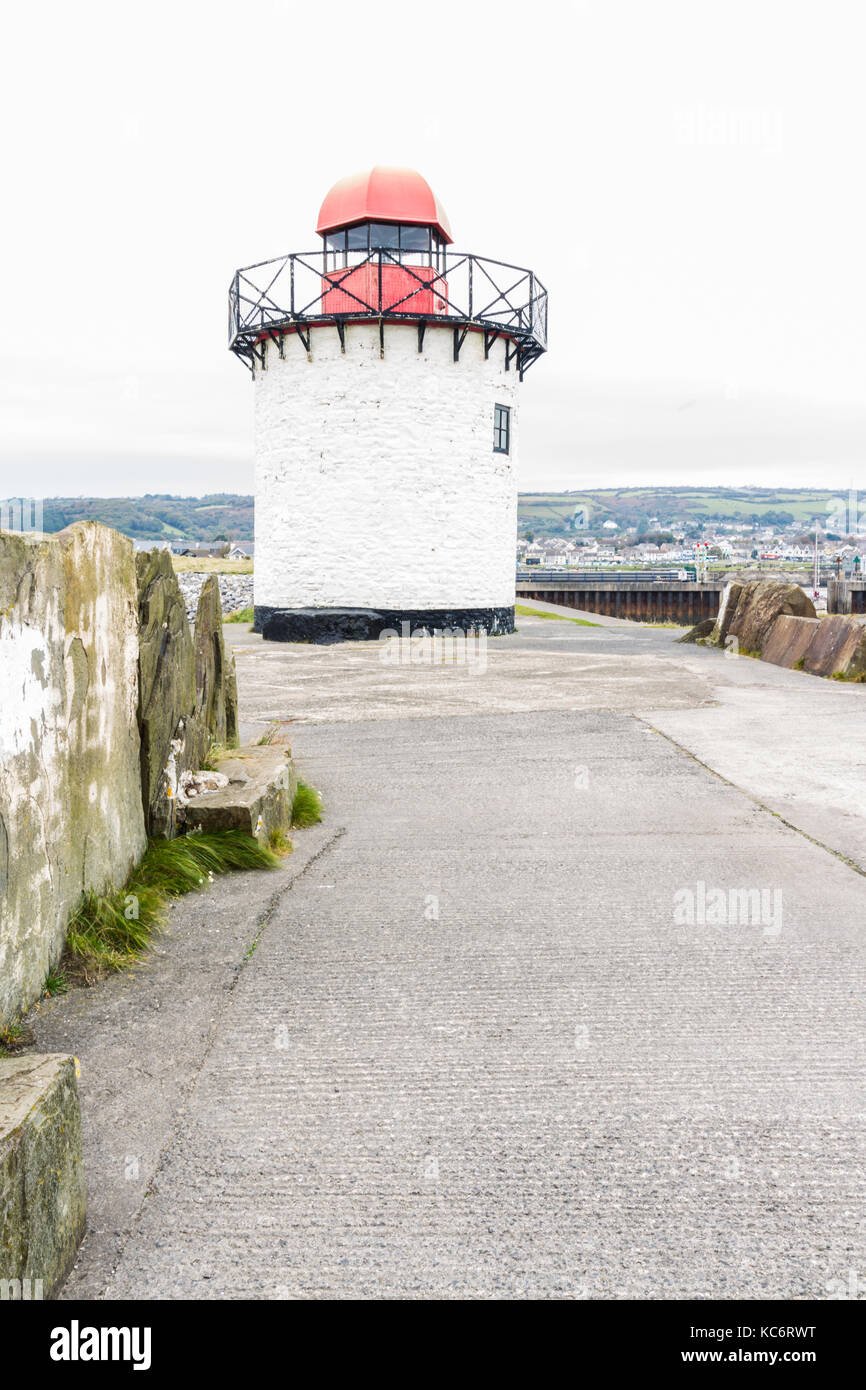 Small white squat white lighthouse with red top. Burry Port, Llanelli ...