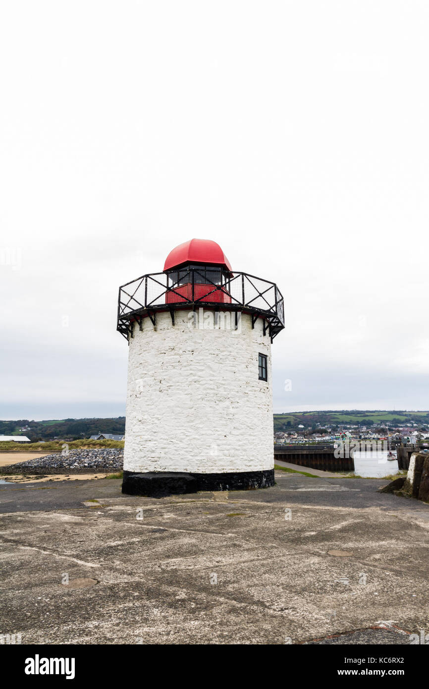 Small white squat white lighthouse with red top. Burry Port, Llanelli ...