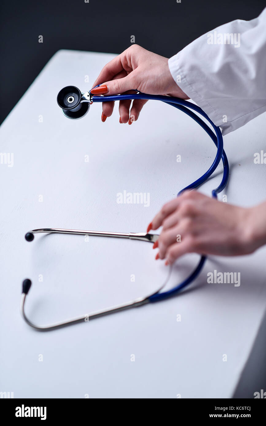 A stethoscope in the hands Stock Photo - Alamy