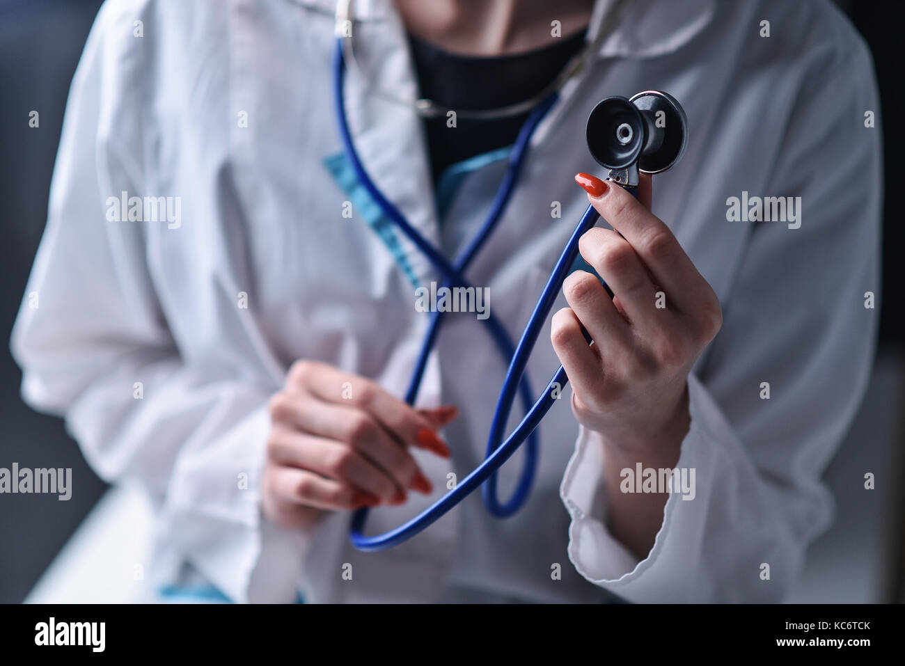 A stethoscope in the hands Stock Photo - Alamy