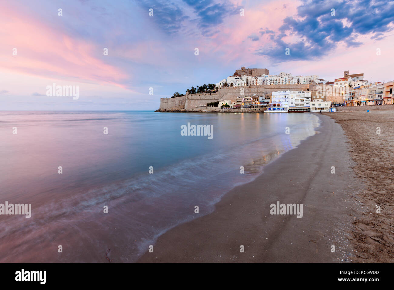 Spain, Valencian Community, Peniscola, Waterfront town at sunset Stock ...