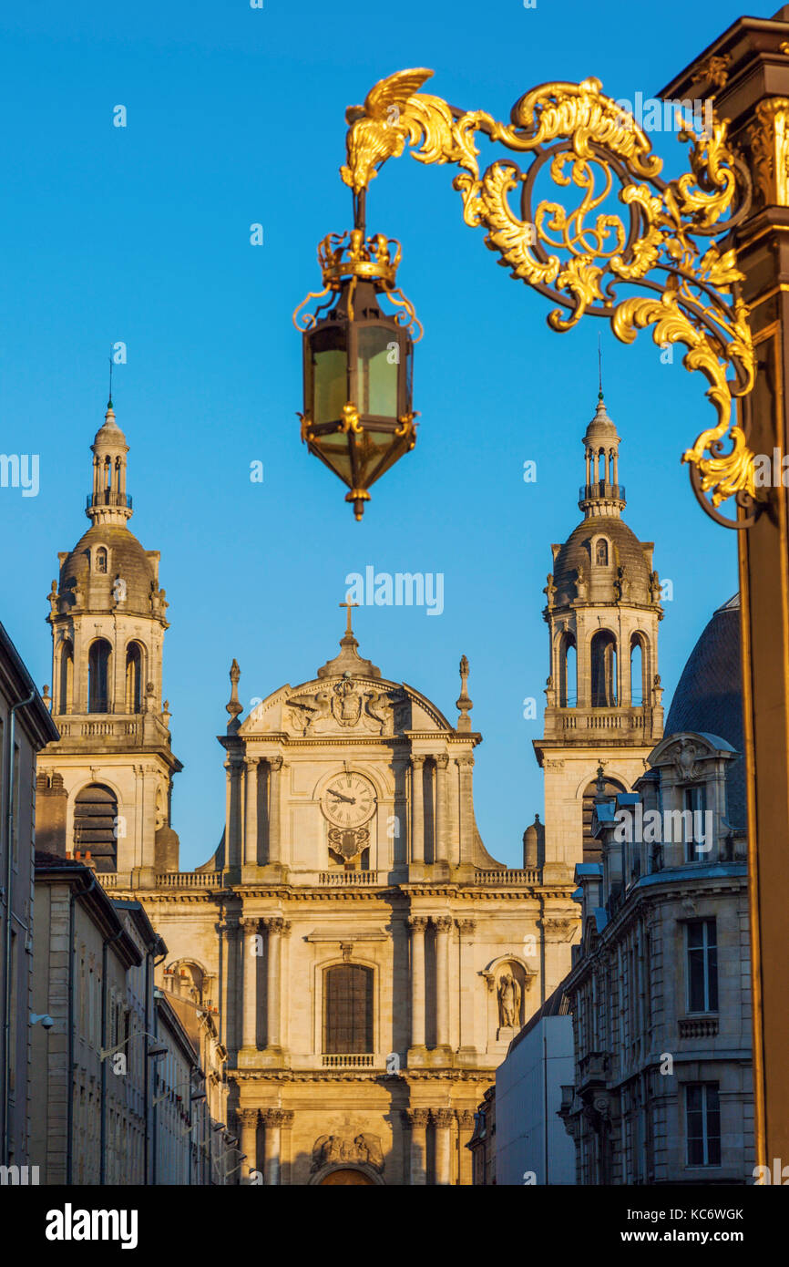 France, Grand Est, Nancy, Ornate street light with Nancy Cathedral in ...