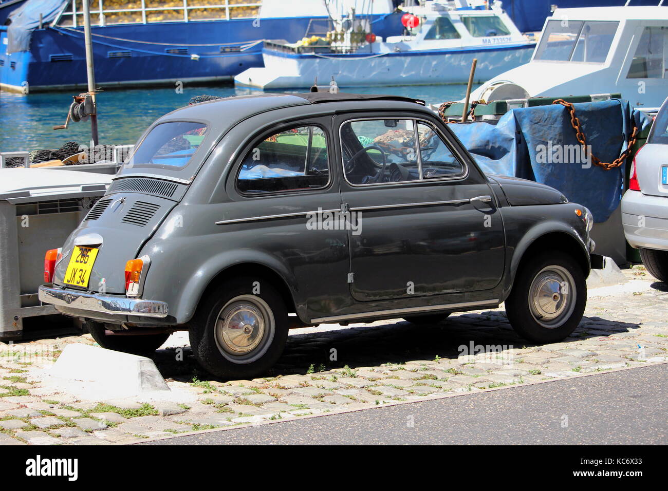 Original old vintage Fiat 500 (Cinquecento) car in grey, parked on a ...