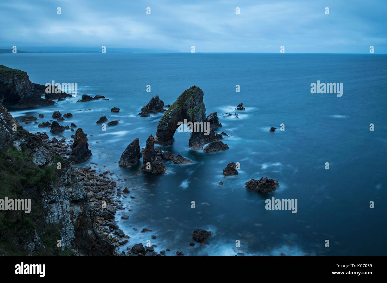 Ireland, County Donegal, Crophy Head rock formation in sea Stock Photo ...