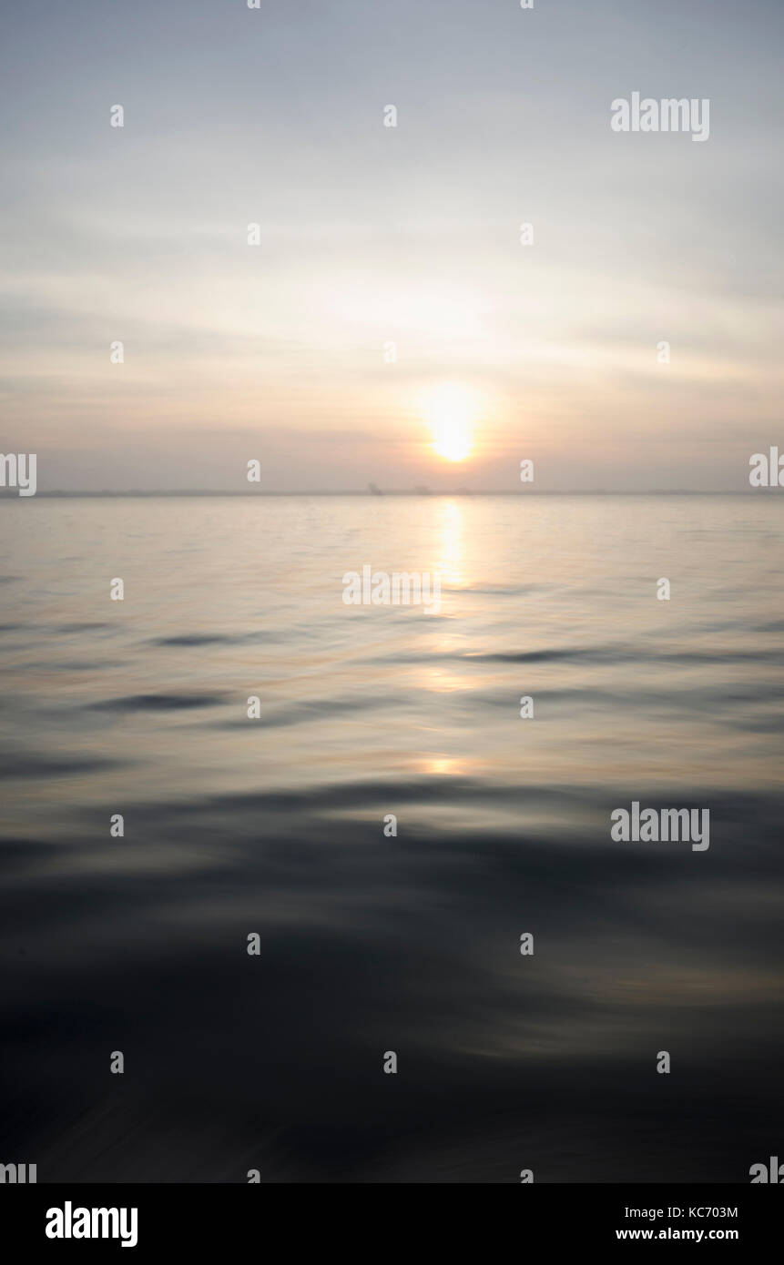 Sea at dawn Stock Photo - Alamy