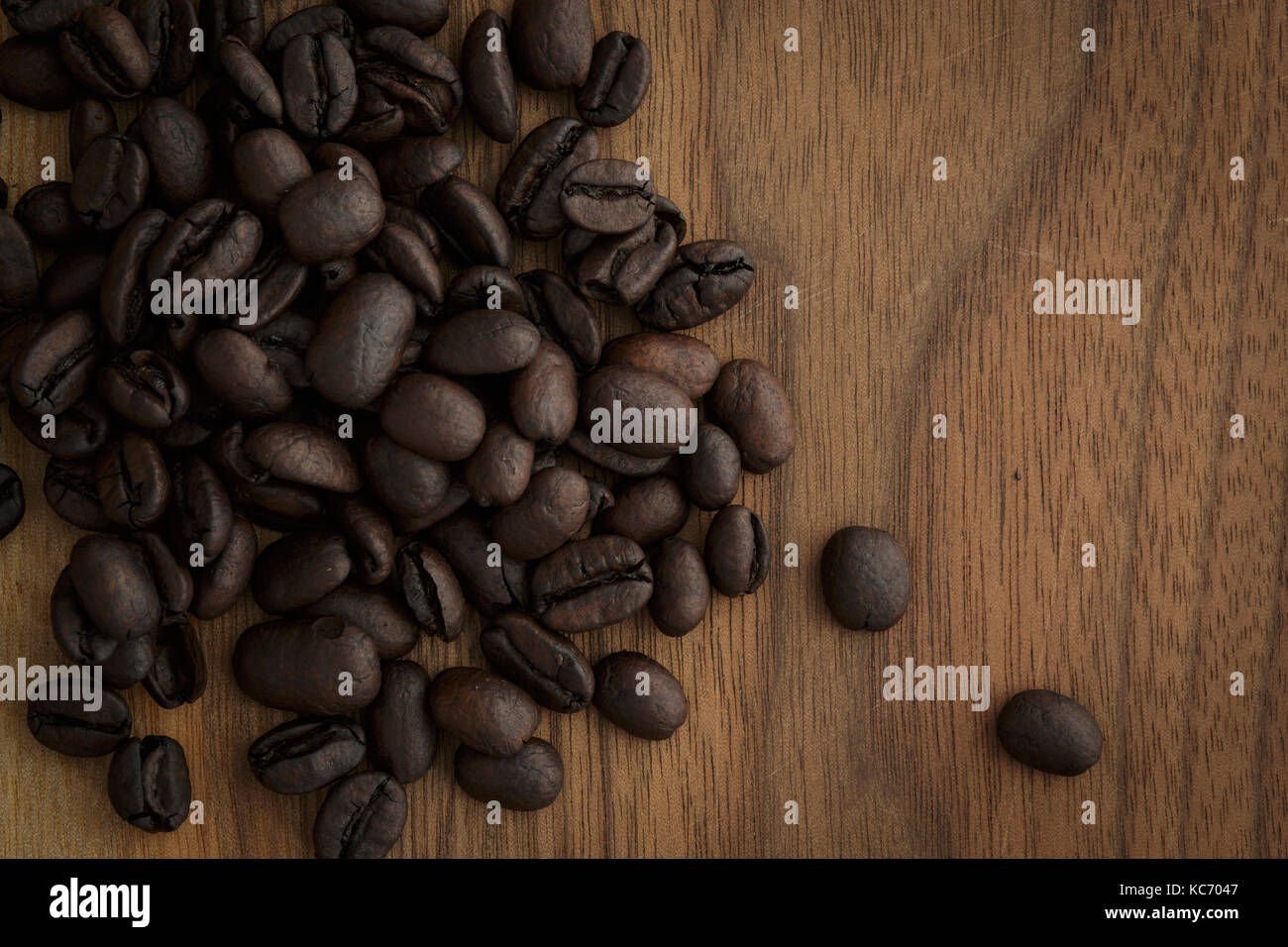 Coffee beans on table Stock Photo - Alamy