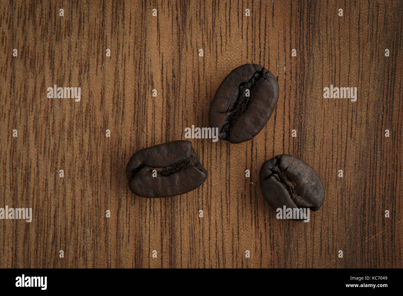 Coffee beans on table Stock Photo - Alamy