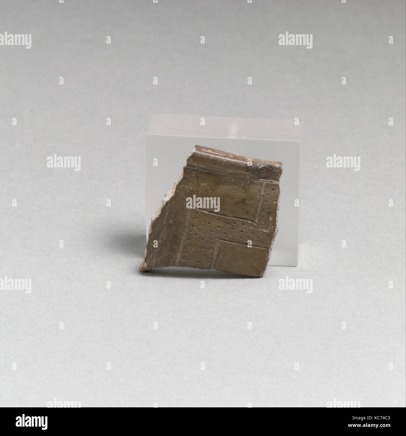 Terracotta rim fragment with incised lines and punctations, ca. 3600 ...