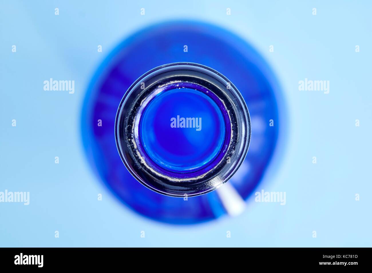 A studio photo of a blue bottle Stock Photo - Alamy