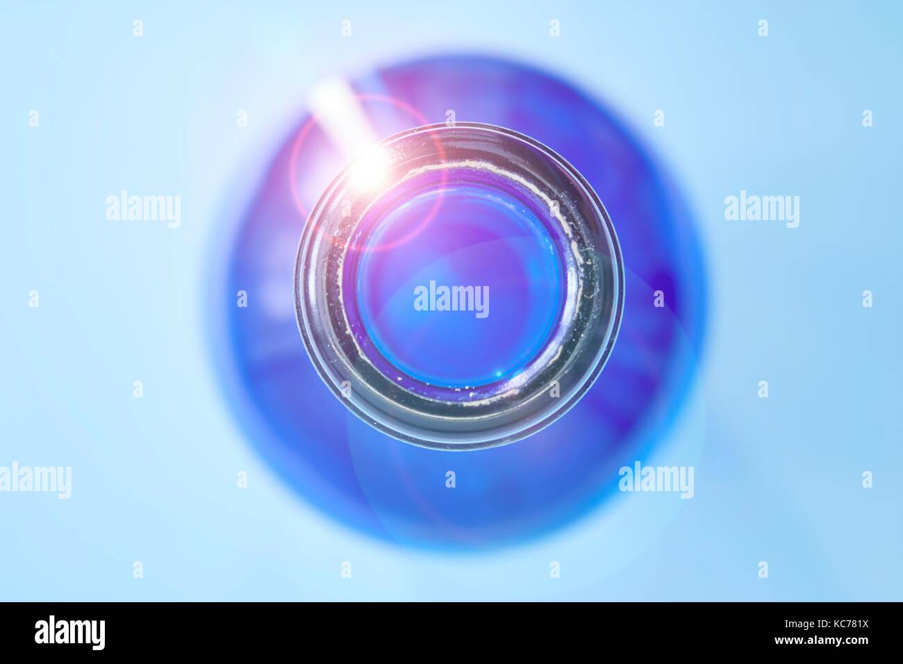 A studio photo of a blue bottle Stock Photo - Alamy