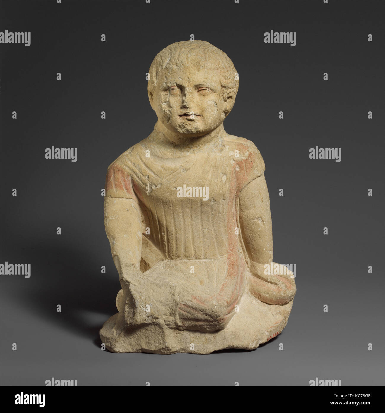 Limestone statuette of a temple boy, 4th century B.C Stock Photo - Alamy