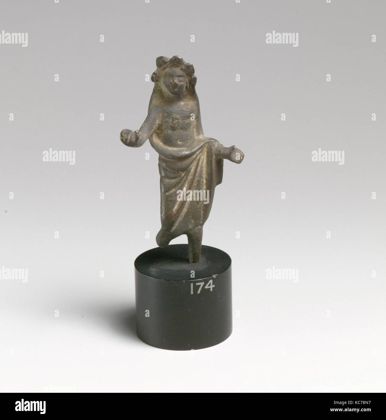 Statuette of a man wearing a mantle over head, Bronze, H.: 3 in. (7.6 ...