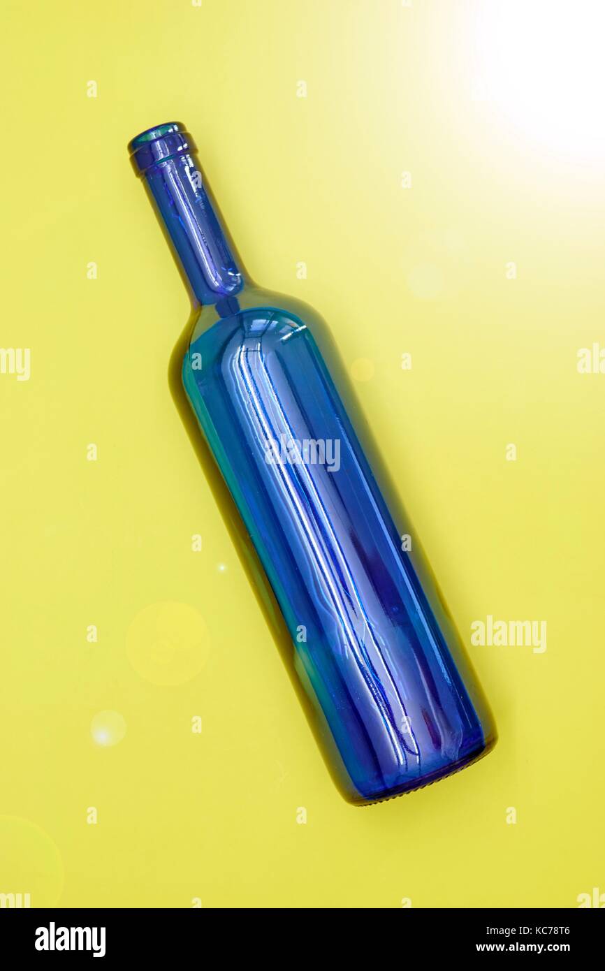 A studio photo of a blue bottle Stock Photo - Alamy