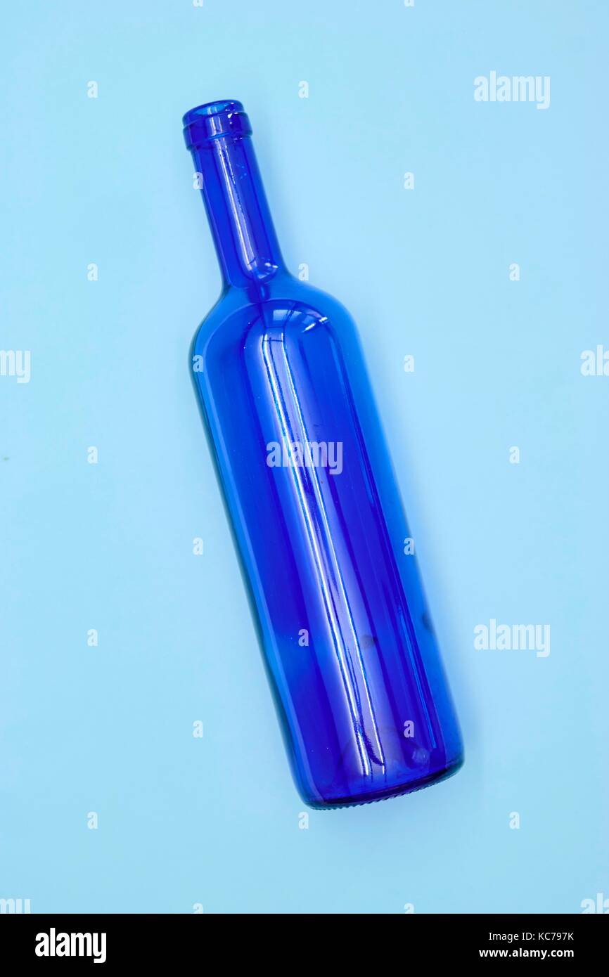 A studio photo of a blue bottle Stock Photo - Alamy