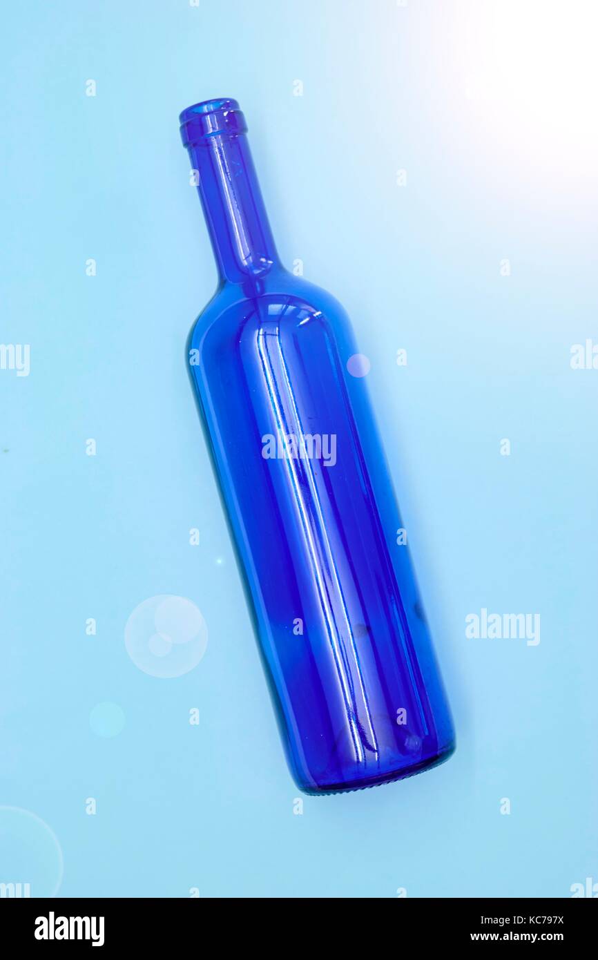 A studio photo of a blue bottle Stock Photo - Alamy