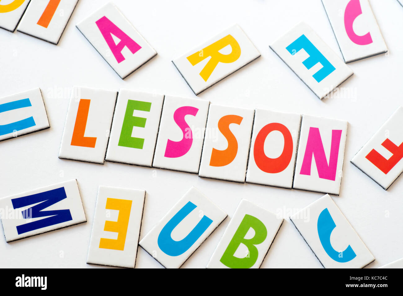 word lesson made of colorful letters on white background Stock Photo ...