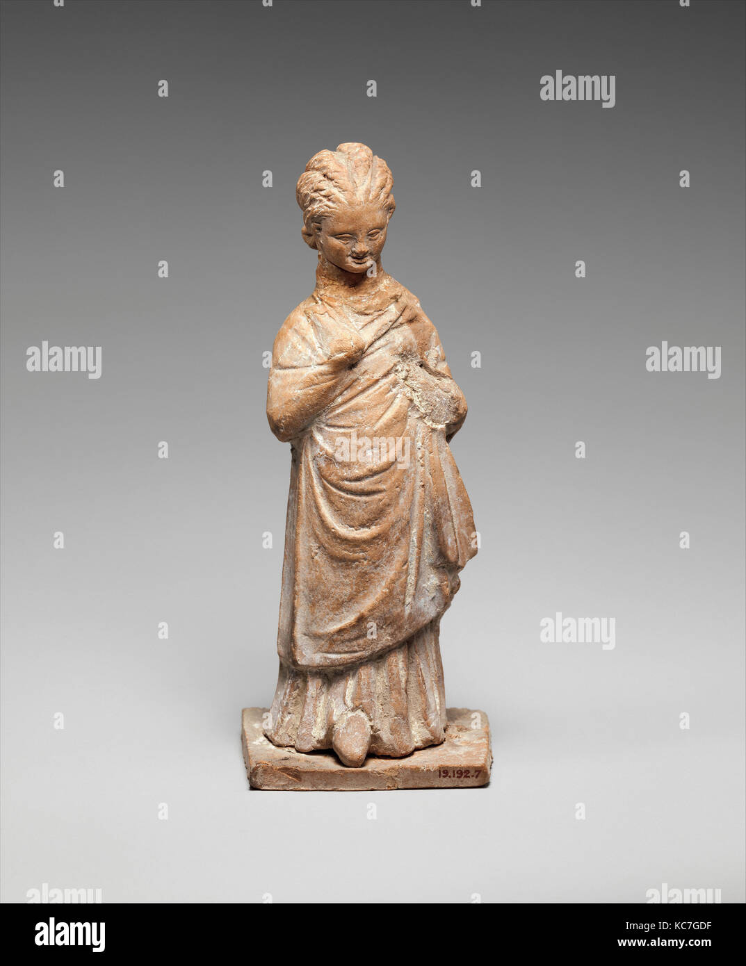 Terracotta statuette of a standing girl, early 3rd century B.C Stock ...