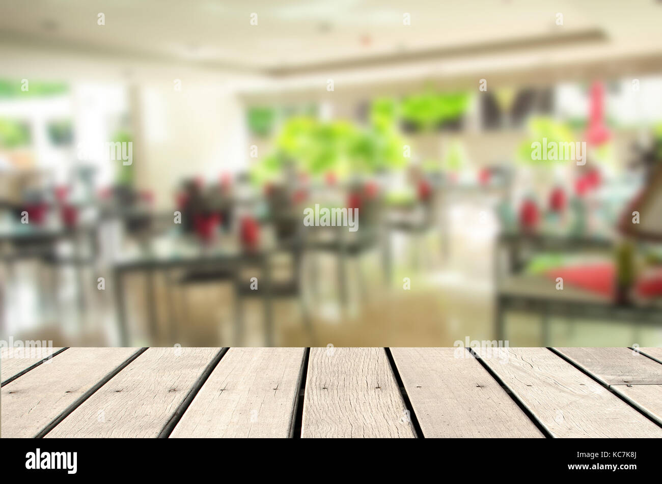 Wood table top Abstract blurred hotel restaurant interior for ...