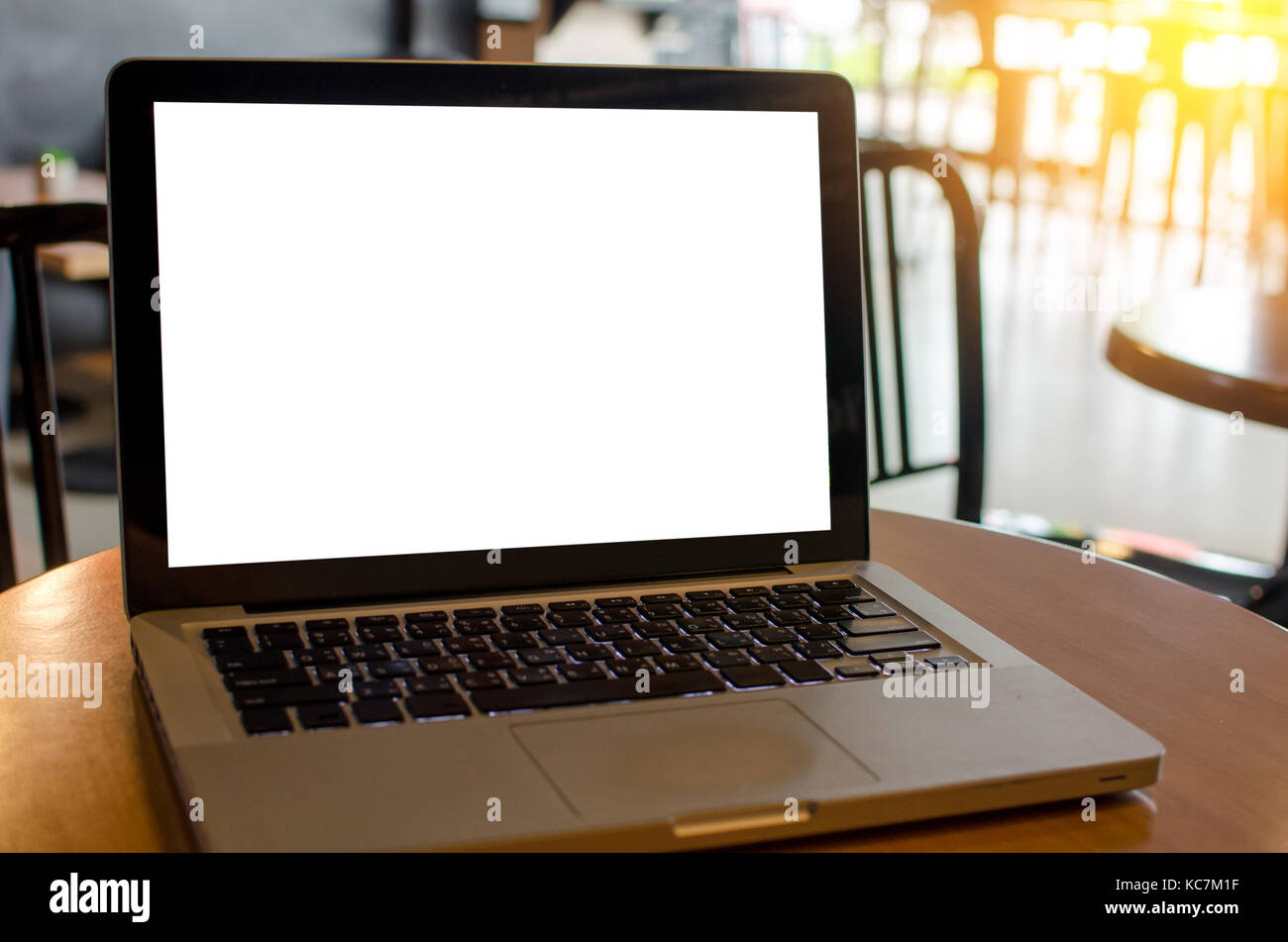 Laptop computer on the table, in the coffee shop Stock Photo - Alamy