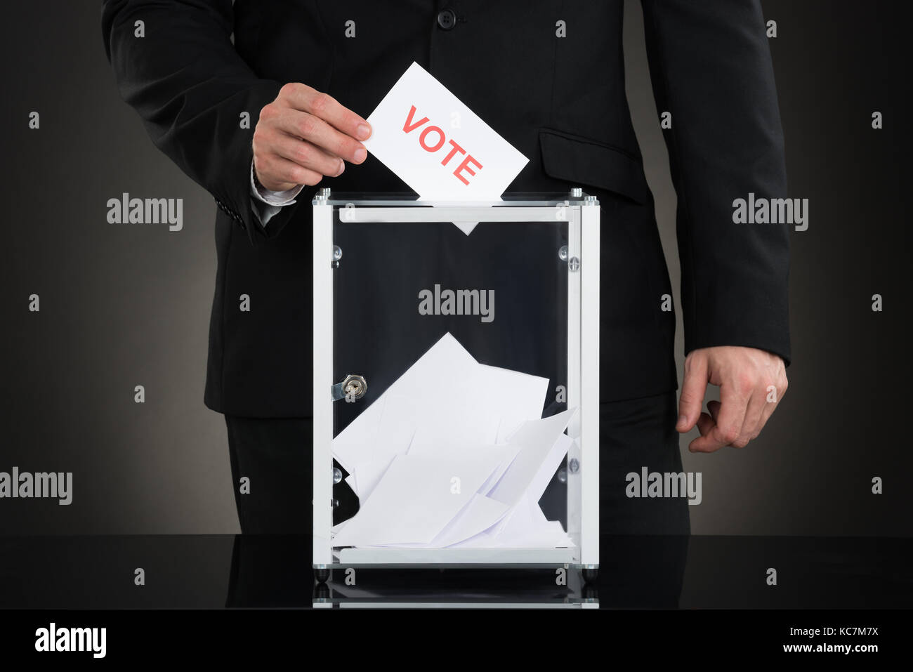 Inserting vote ballot box hi-res stock photography and images - Alamy