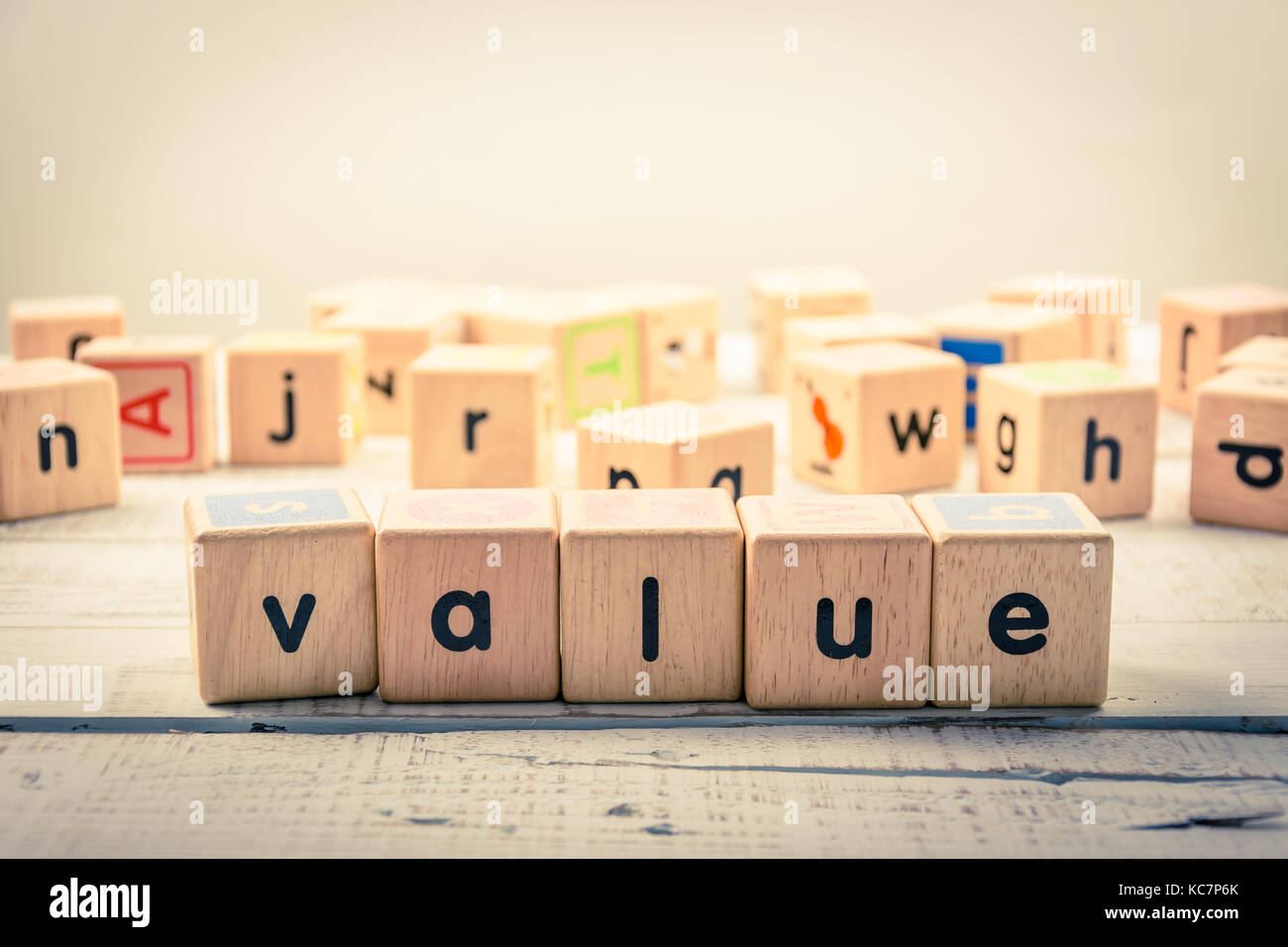 Word 'Value ' wood Cubic on the wood Stock Photo - Alamy