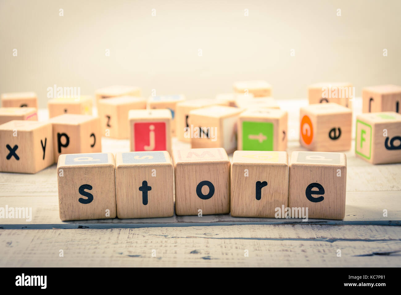 Word 'Store ' wood Cubic on the wood Stock Photo - Alamy