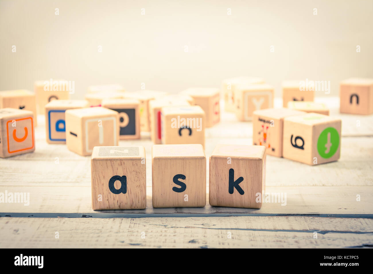 Word 'Ask ' wood Cubic on the wood Stock Photo - Alamy