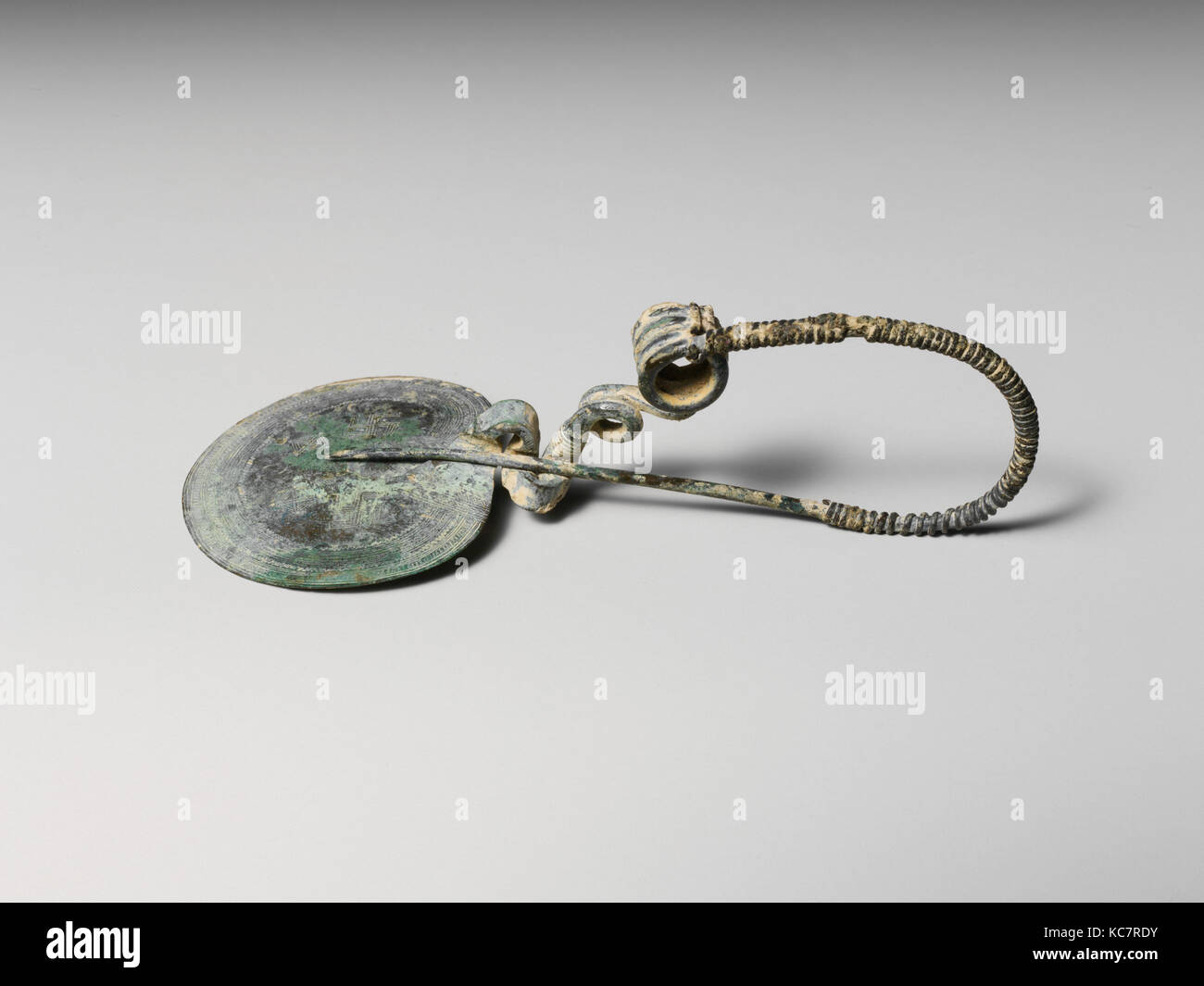 Bronze disc-type fibula (safety pin), 9th–8th century B.C Stock Photo ...