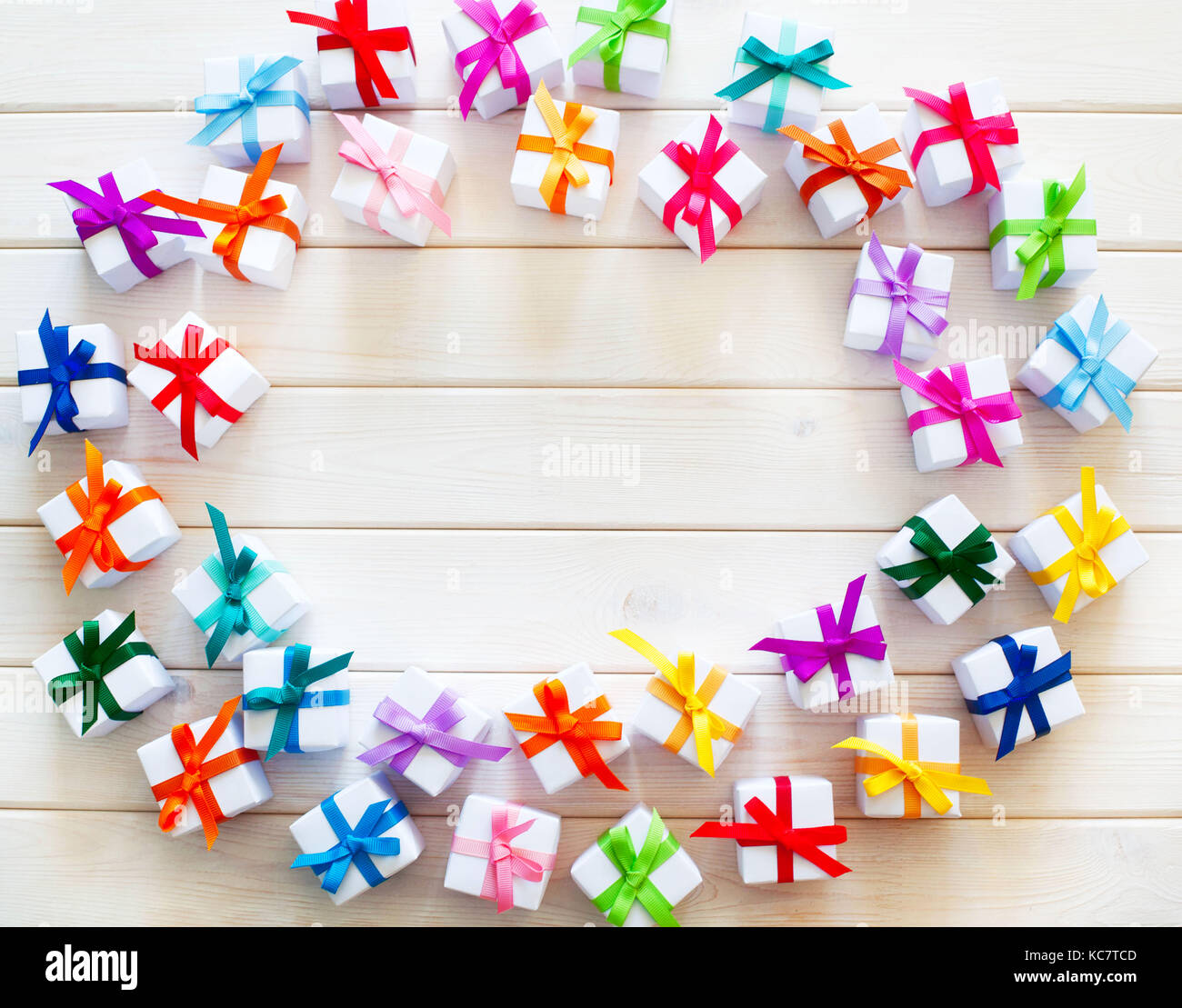 A lot of small gifts with color ribbons Stock Photo - Alamy