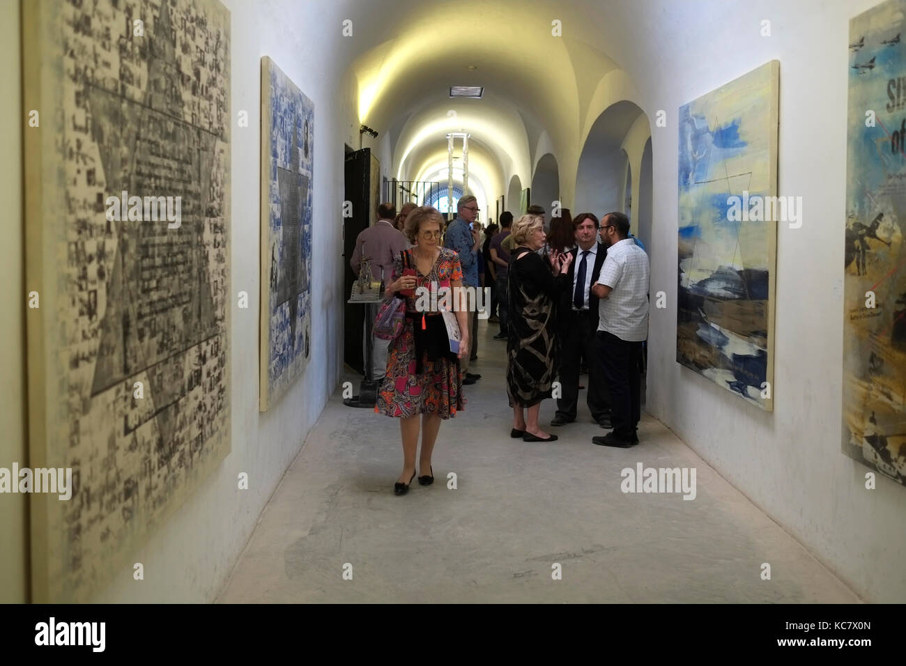 Paintings by American artist Barbara Hines displayed at the opening of ...