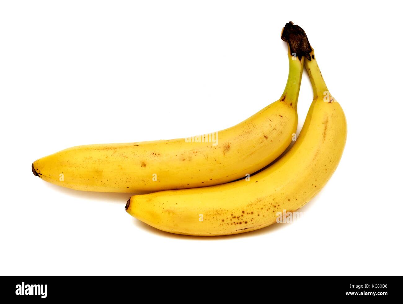 Two bananas on a white background Stock Photo - Alamy